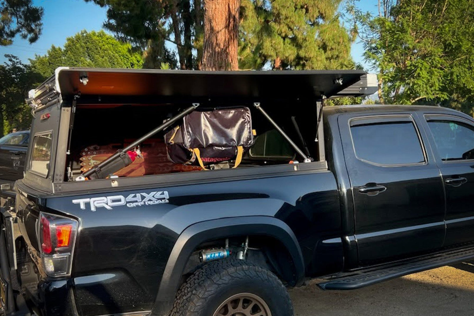 Hang duffels as cabinets in truck toppers – ideal for truck bed camping ...